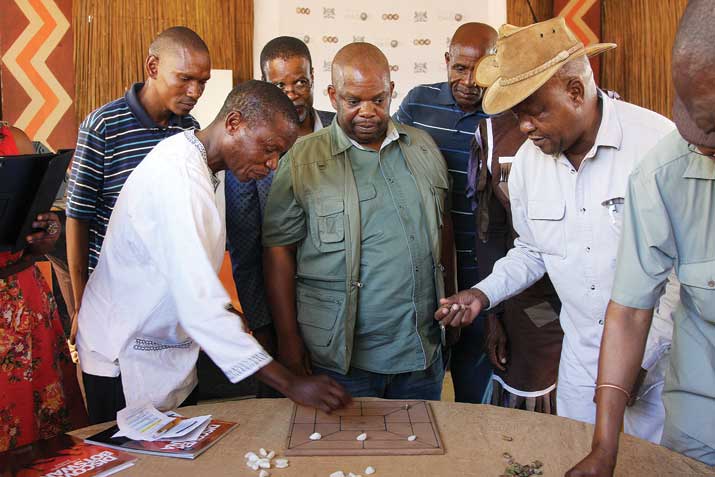 Kgosi-Malope-watching-a-game-of-mohele-at-the-Ntlo-ya-Dikgosi-cultural ...